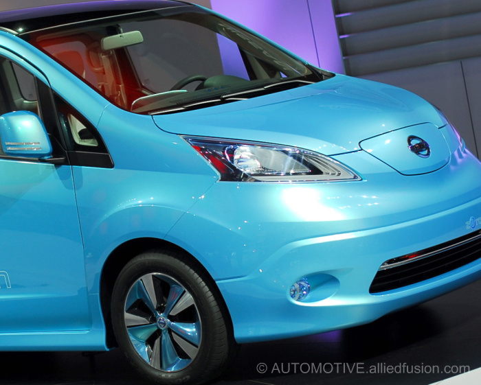 Green Nissan van with a Blue makeover